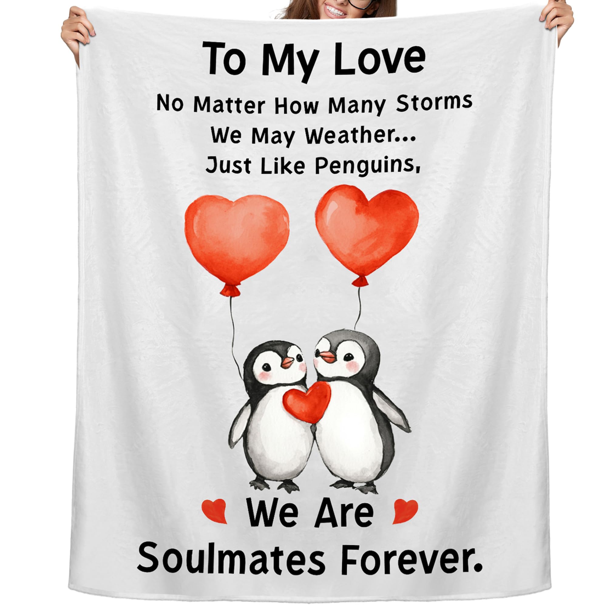 Une couverture romantique à motifs de pingouins, parfaite pour la Saint ...