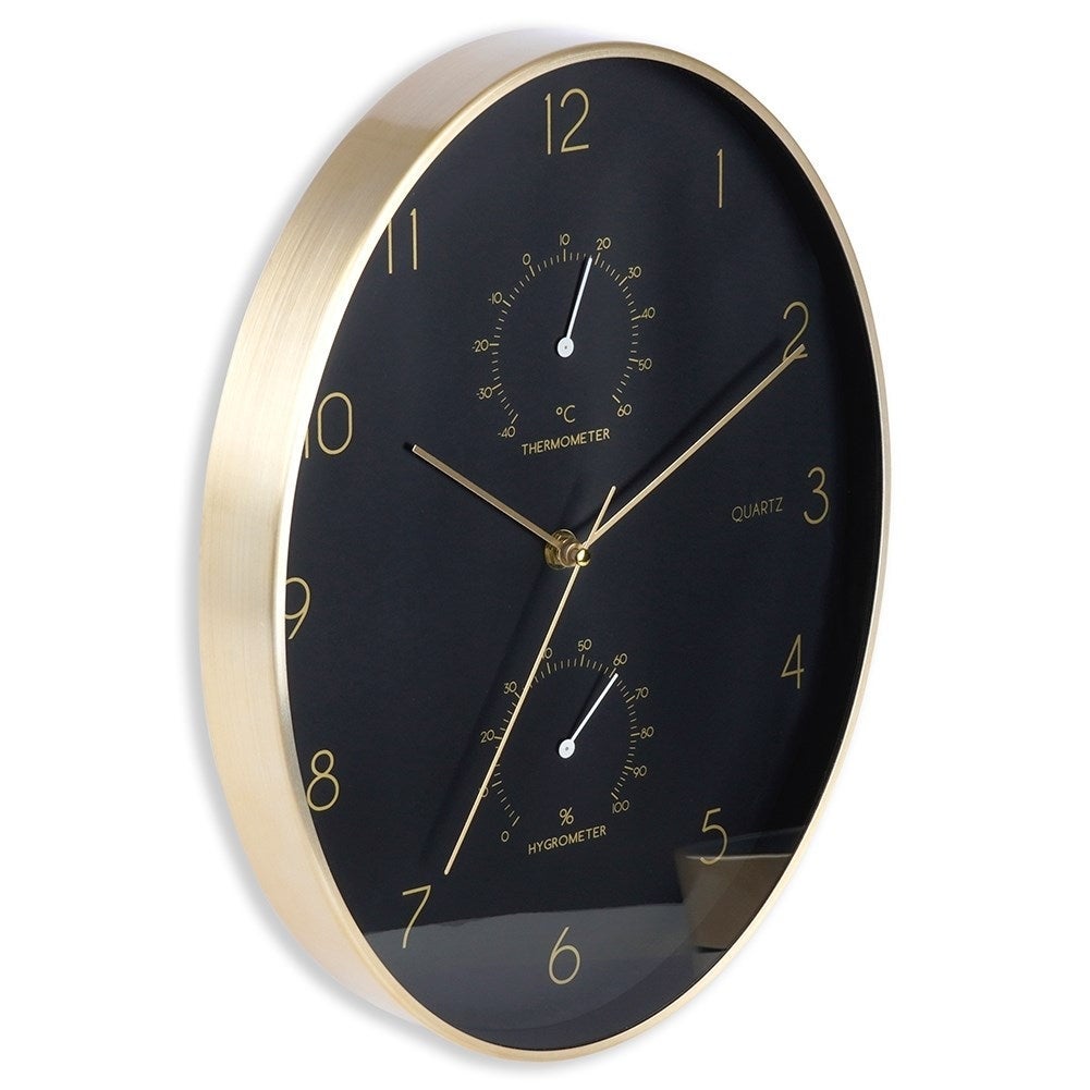 Horloge murale ovale avec thermomètre et hygromètre 27x34,5 cm | Leroy ...