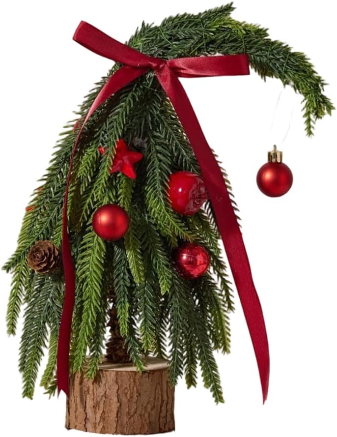 Artificial curved mini Christmas tree decorated with red balls and pine ...