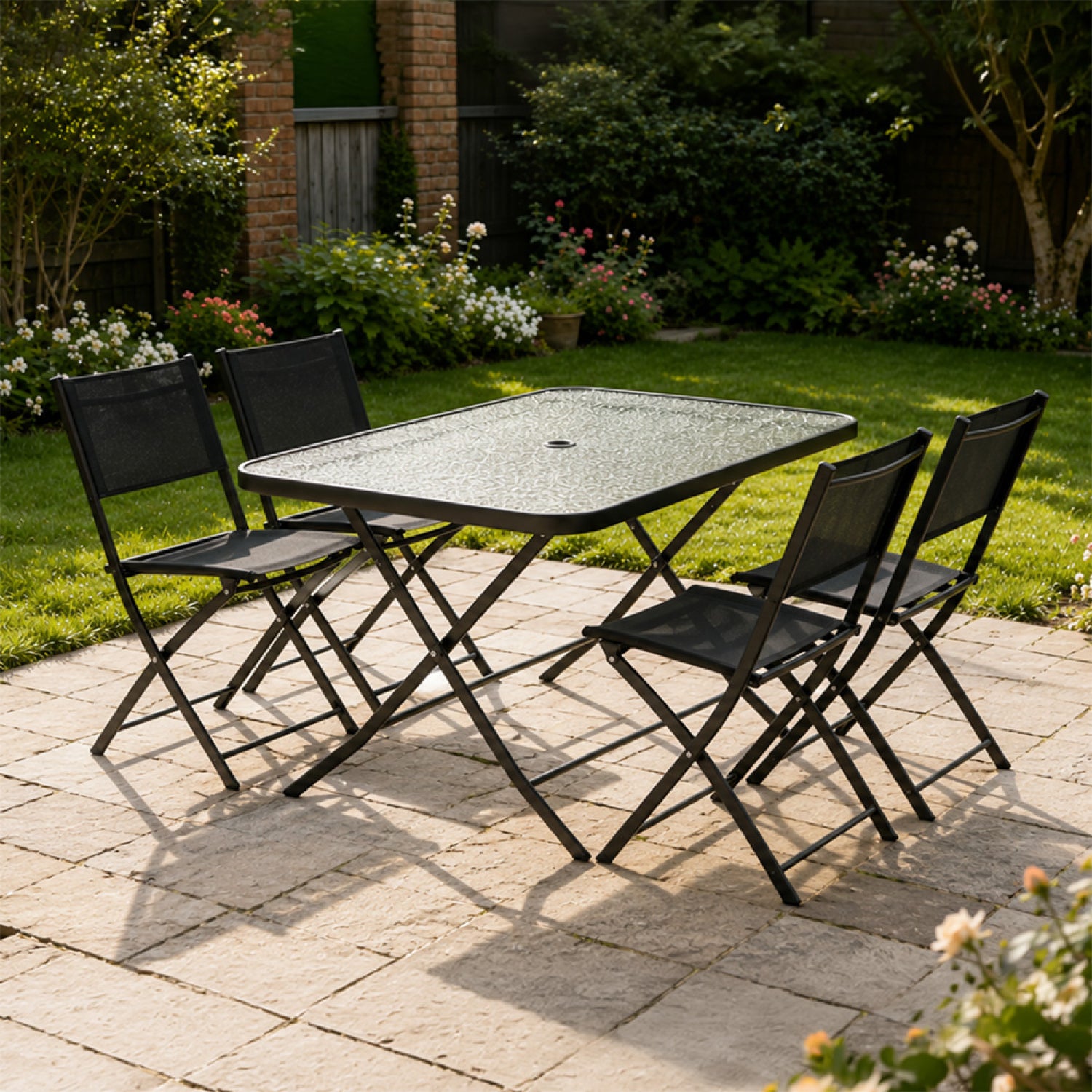 MAHON Juego de mesa de jardín de 130 cm y 4 sillas plegables | Leroy Merlin