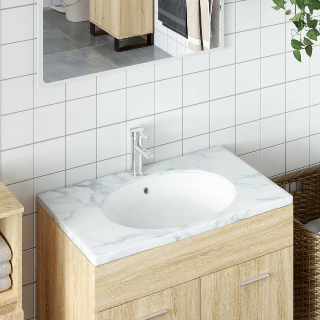 VidaXL Lavabo de baño ovalado cerámica blanco 49x40,5x21 cm | Leroy Merlin