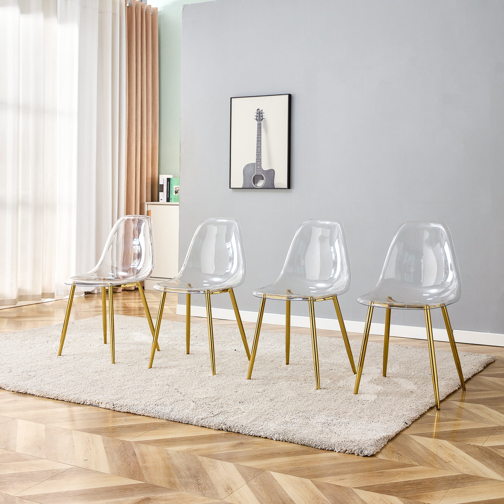 Lot de 4 chaises transparentes en polycarbonate - Piètement métal doré ...
